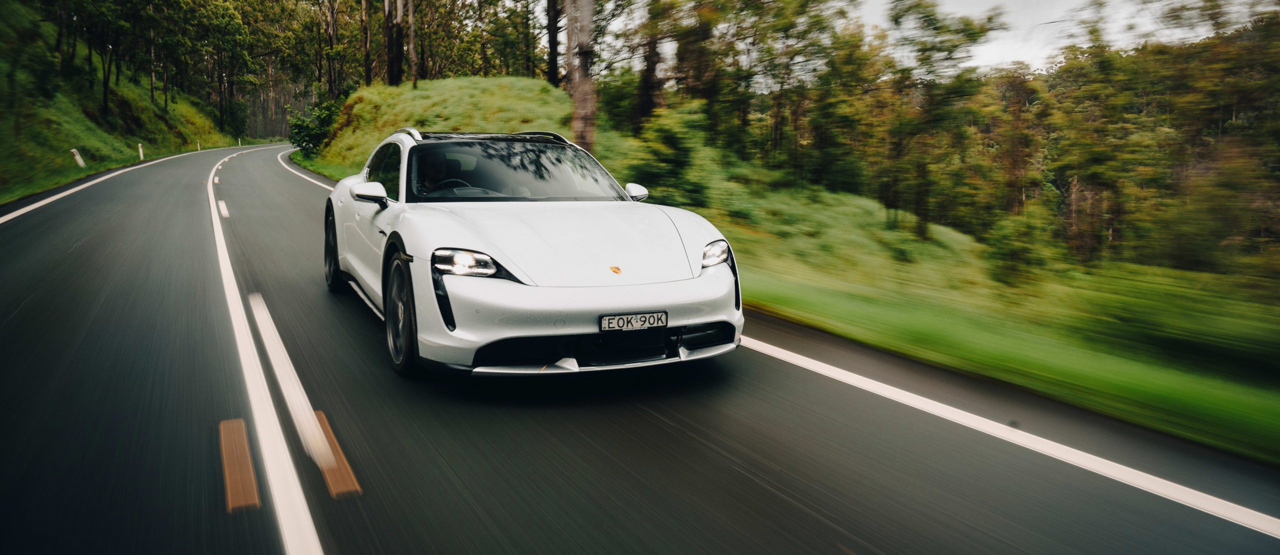 Porsche Taycan Turbo Cross Turismo - on a wet road • Peter Lloyd - Car ...